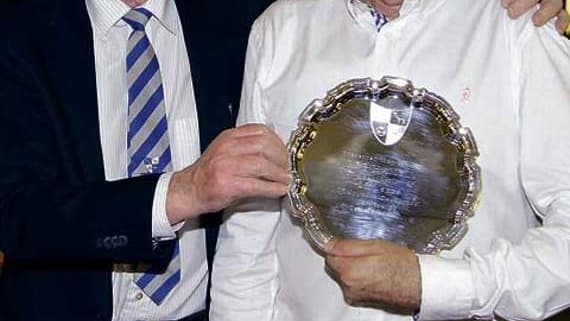 Presentation to Reg as he notches up 25 years as football club manager ...